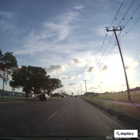 Traffic incident involving red sedan and black truck on Pioneer Pkwy ...