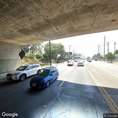 Male waving white object at intersection in Los Angeles, Los Angeles CA ...
