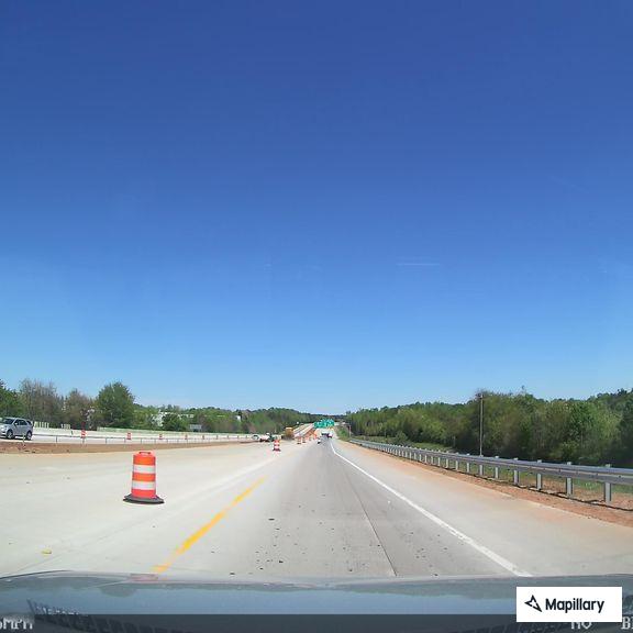 Vehicle stopped against wall near 82 mile marker southbound ...
