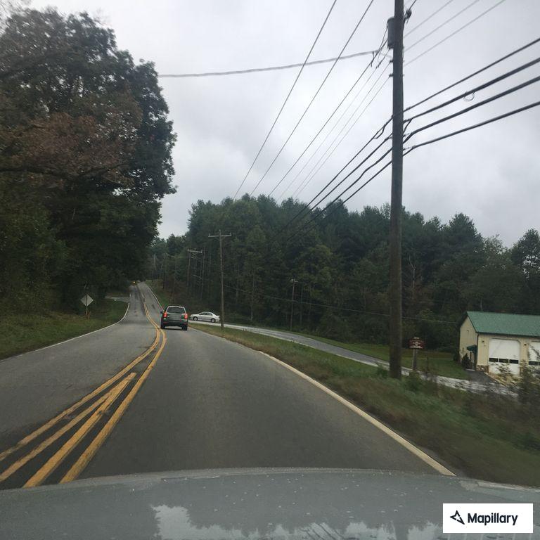 Oil and debris reported on Brevard Road causing hazard, Henderson ...