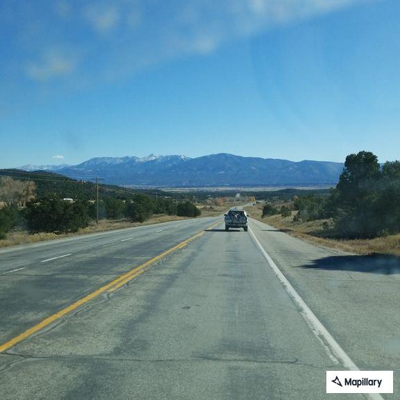 Small gold vehicle swerves and speeds south on Hwy 285, Chaffee County ...