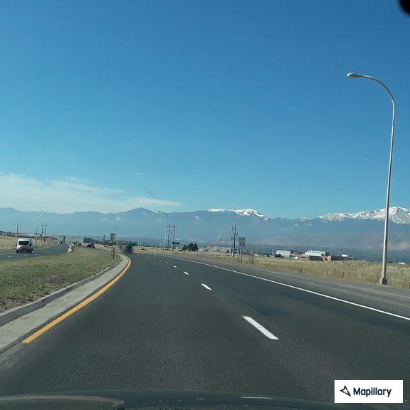 School bus sparks on highway near North Powers Boulevard, Colorado ...