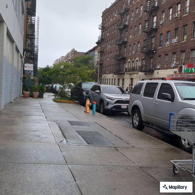 Person asleep near trash can on subway platform, New York NY | CrimeRadar