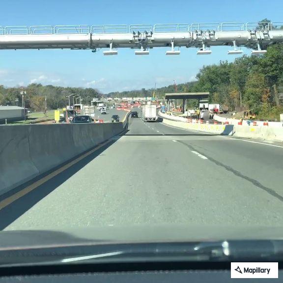 Vehicle stopped on left shoulder near highway overpass, Woodbury NY ...