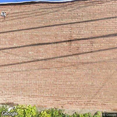 Light pole damages building near Stony Island Ave, Chicago IL | CrimeRadar