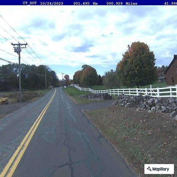 Black SUV parked on street with children inside, Granby CT | CrimeRadar