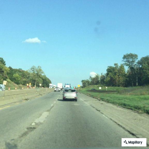 Traffic hazard with orange barrel on highway, Jackson County MI ...