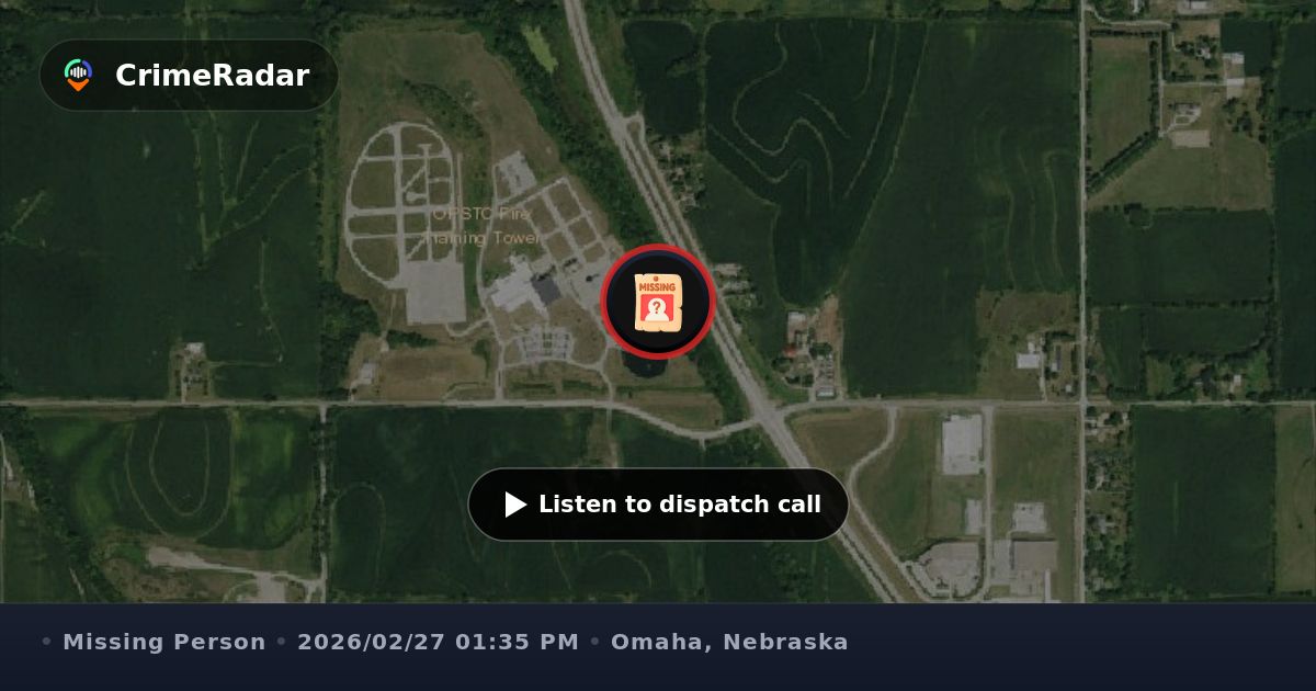 Officer with returned runaway at police department, Omaha NE | CrimeRadar