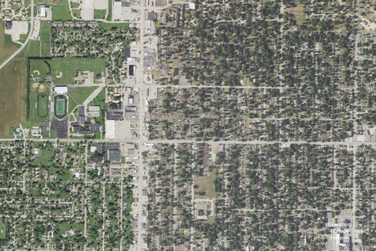 Two people physically fighting inside broken white sedan, Galesburg IL ...
