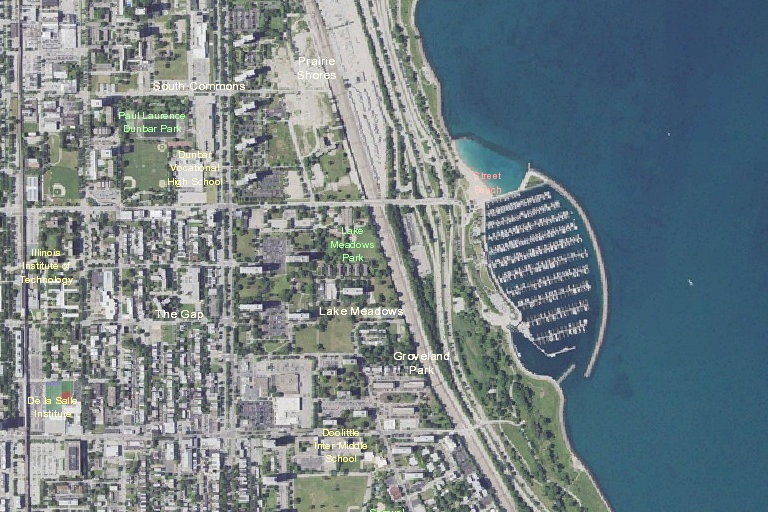 Unoccupied gray car blocking driveway on Lake Park, Chicago IL | CrimeRadar