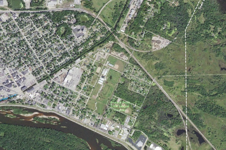 Solid waste truck pulls down utility cable on street, Portage WI ...
