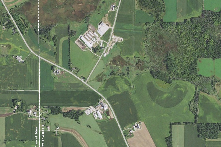 Blue car stops on highway shoulder after deer strike, Fond Du Lac ...